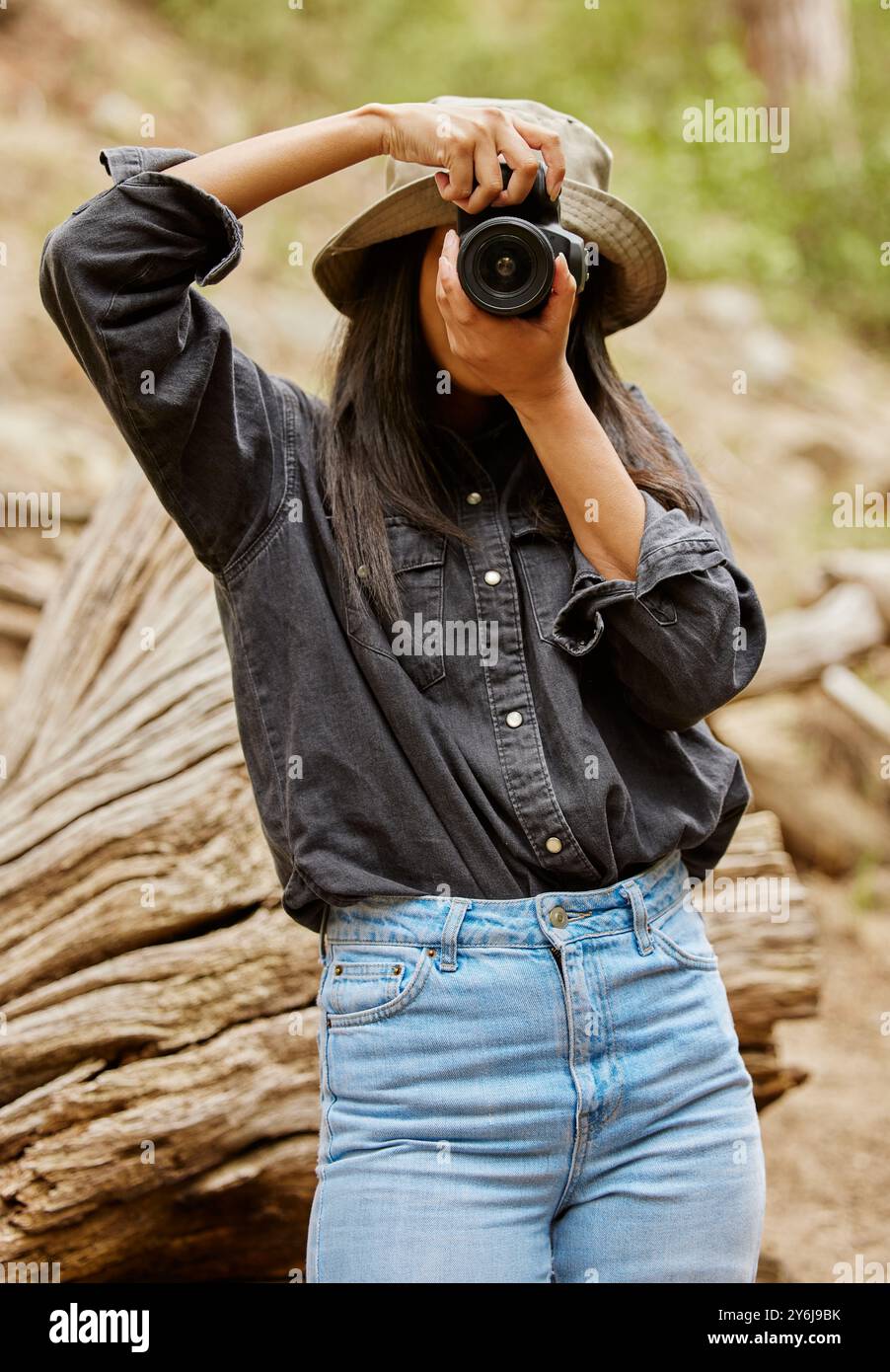 Woman, photographer and camera to explore outdoor, hiking and forest for travel journalism ...