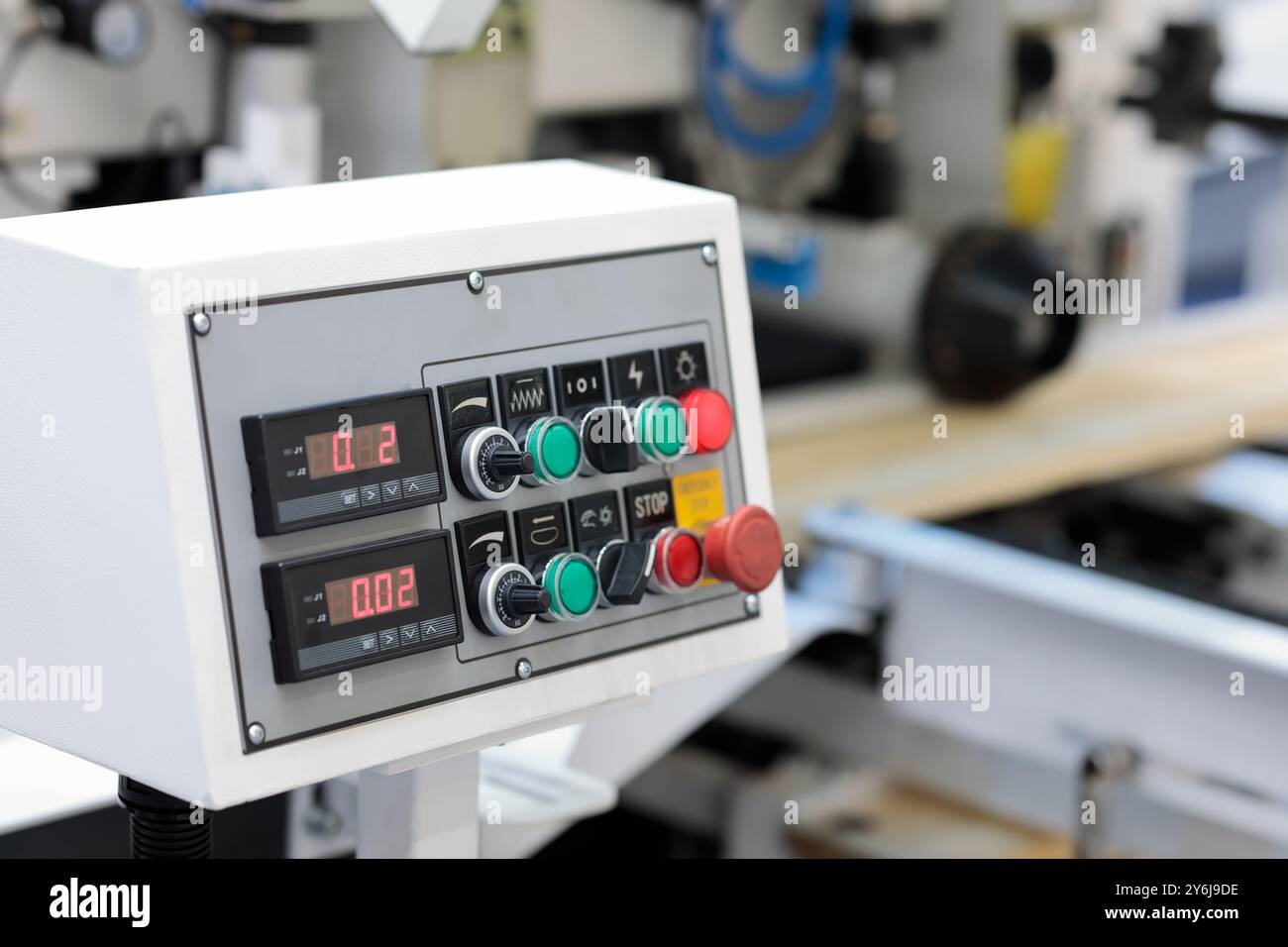 Control console of automated production equipment close up. Selective ...