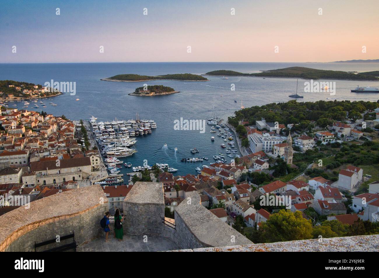City of Hvar. It shows an outdoor scene with the sky, water, beach ...