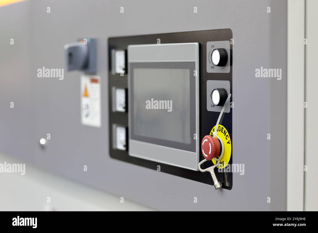 Touch screen control panel of automated industrial equipment close up ...