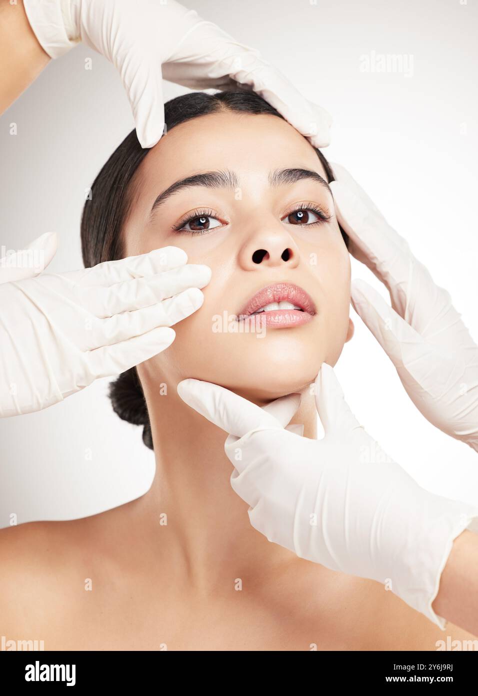 Hands, portrait woman for plastic surgery in studio with facial check ...