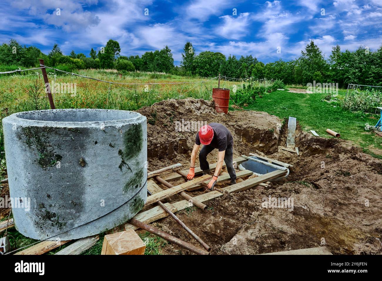 Improvised roller bed system made from steel pipes and wooden planks ...