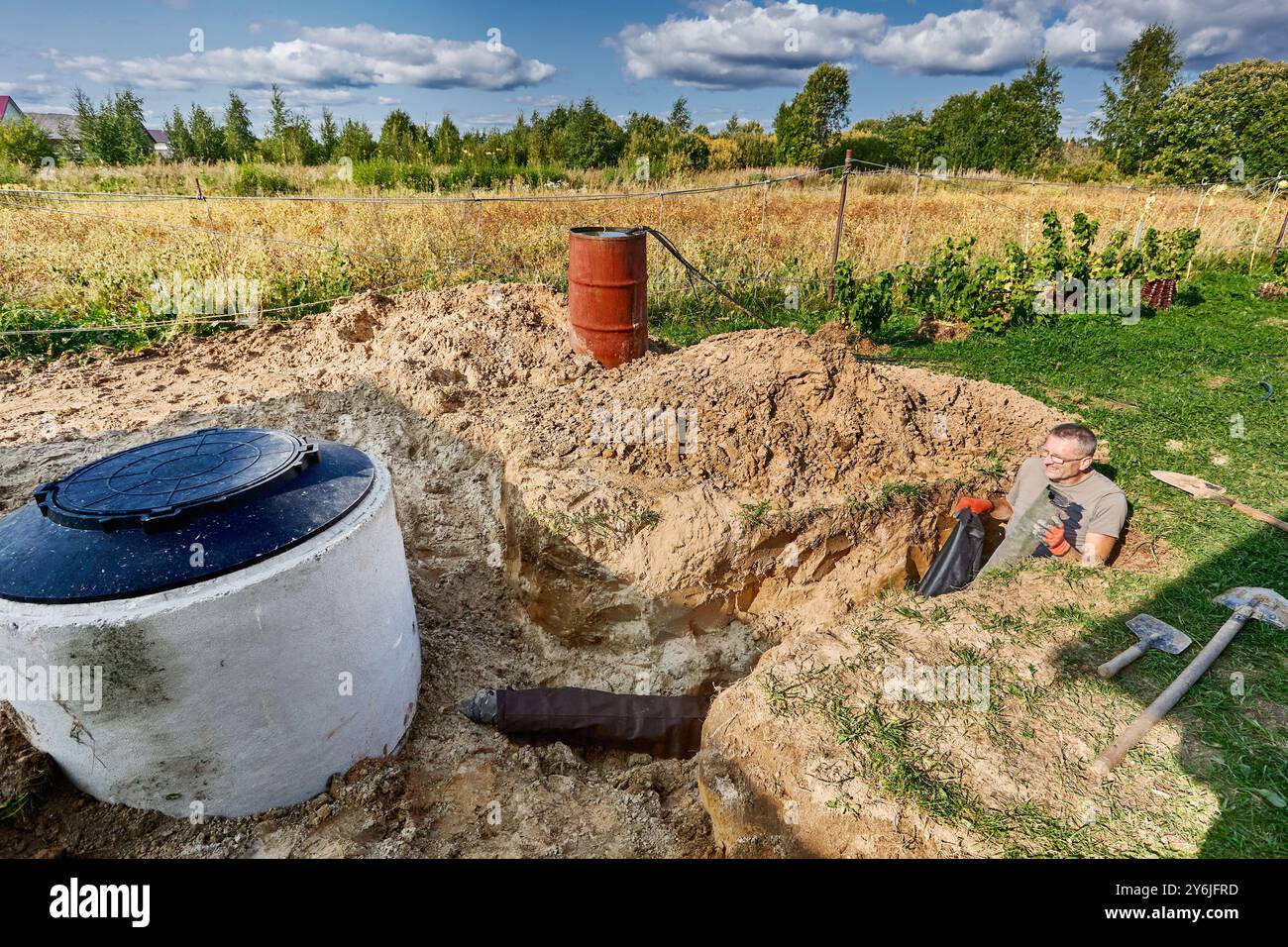 Anaerobic septic system works with drainage field that surrounds Stock ...