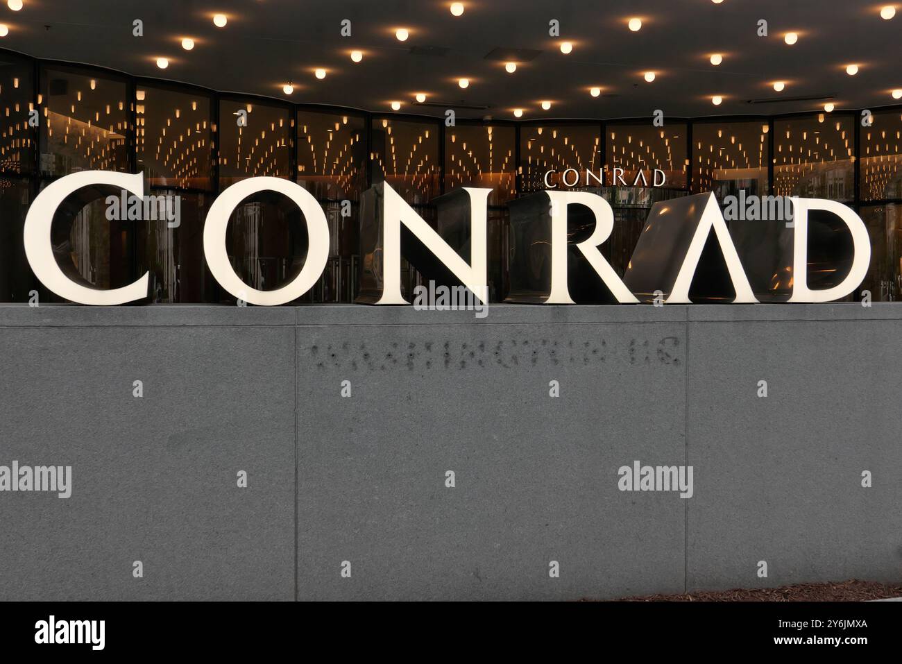 SIGN OF CONRAD HOTEL Stock Photo - Alamy