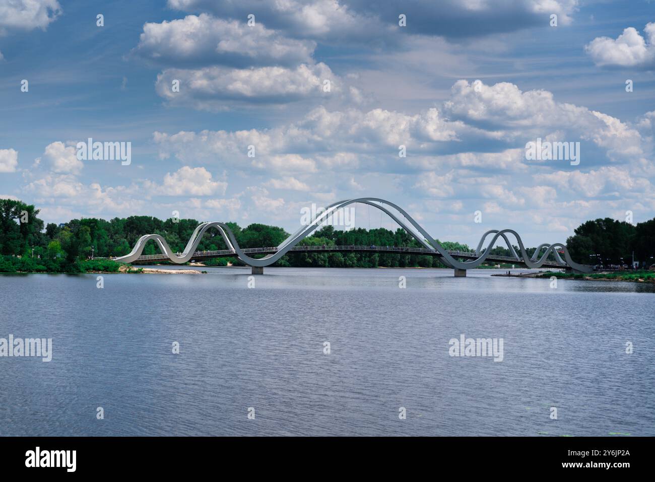 The Wave of Azov pedestrian bridge in Kyiv park Natalka Stock Photo - Alamy