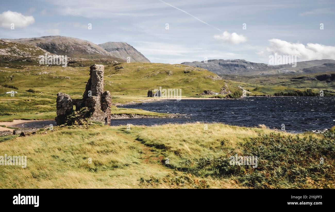 Historic ruins of Ardvreck Castle by the scenic Loch Assynt in Scotland ...
