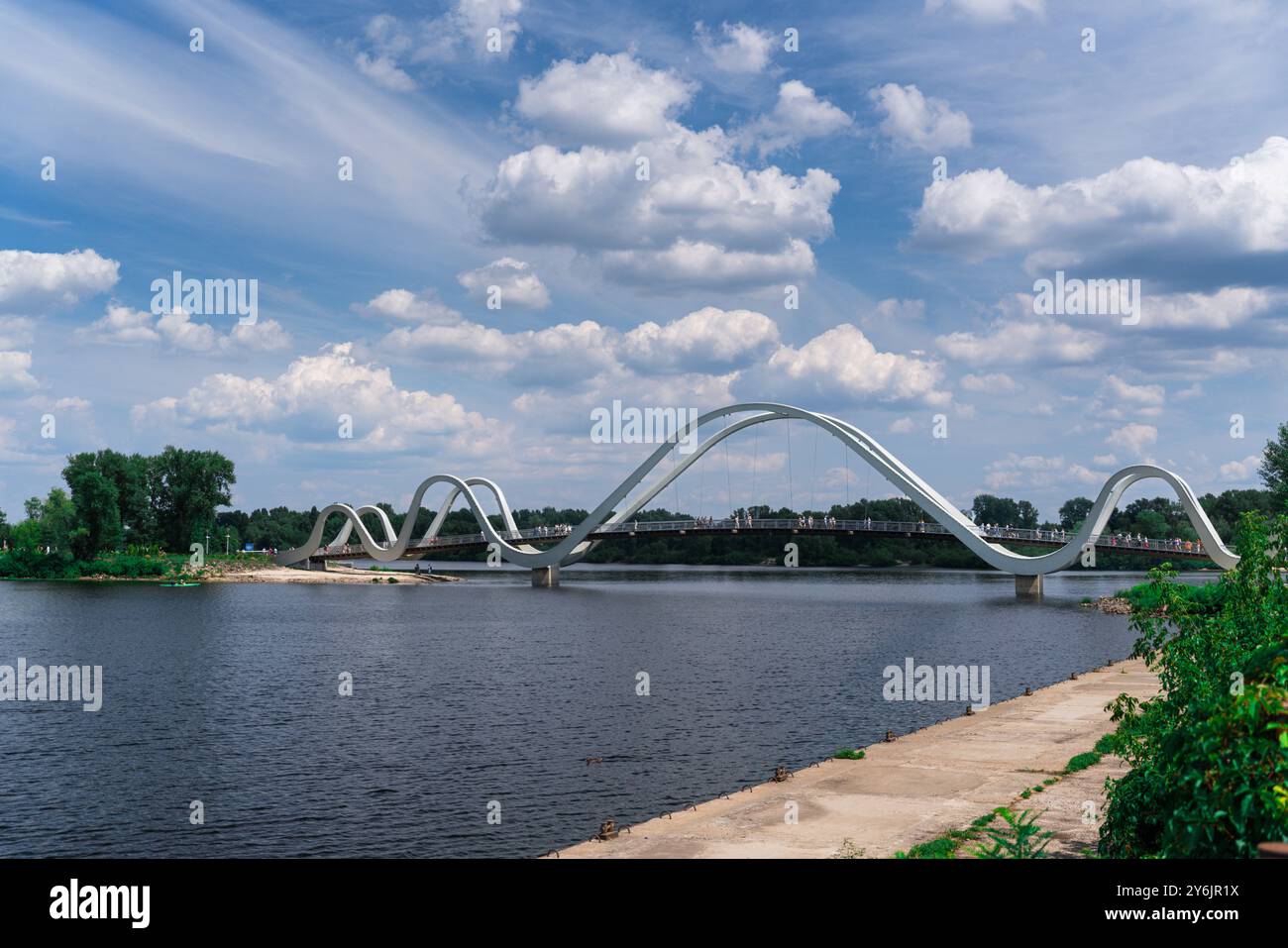 The Wave of Azov pedestrian bridge in Kyiv park Natalka Stock Photo - Alamy