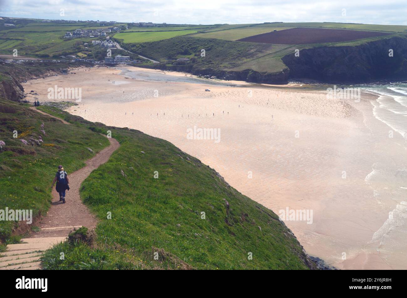 Single Woman (Hiker) Walking on Clifftops to the Beach Mawgan Porth Bay ...