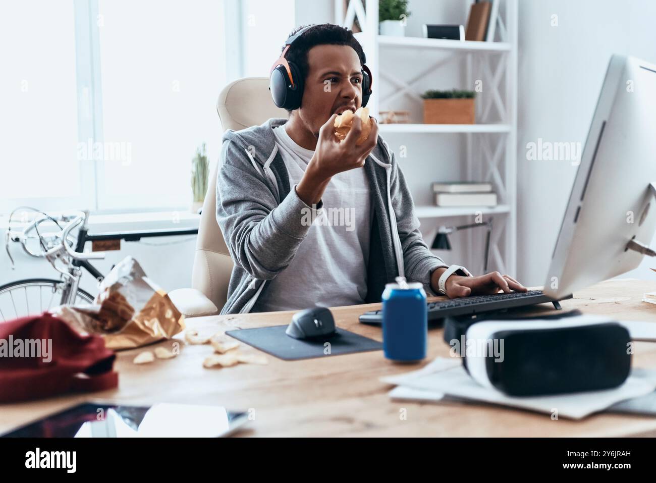 Man sitting computer hacker activity hi-res stock photography and ...