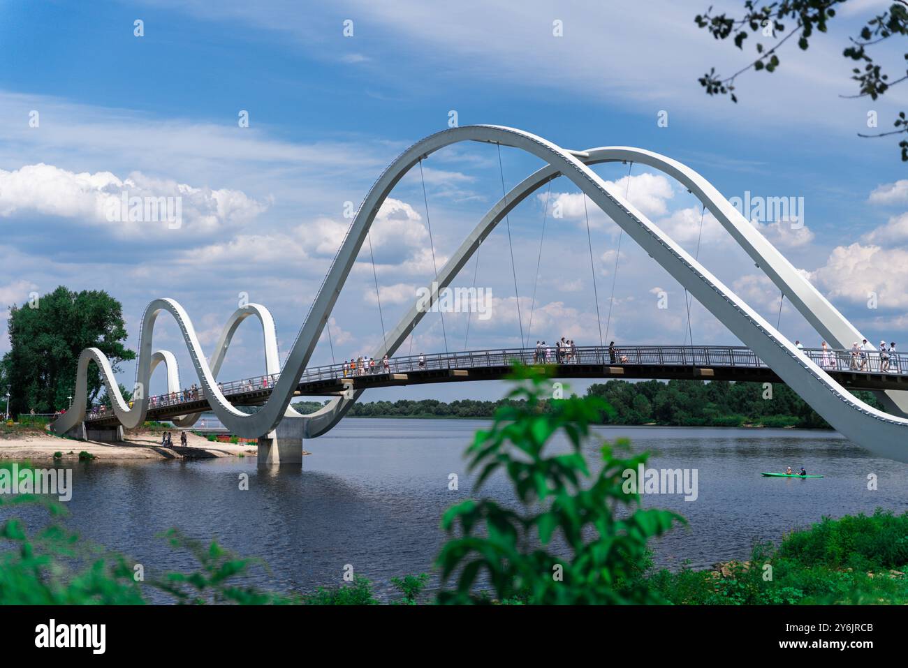 The Wave of Azov pedestrian bridge in Kyiv park Natalka Stock Photo - Alamy