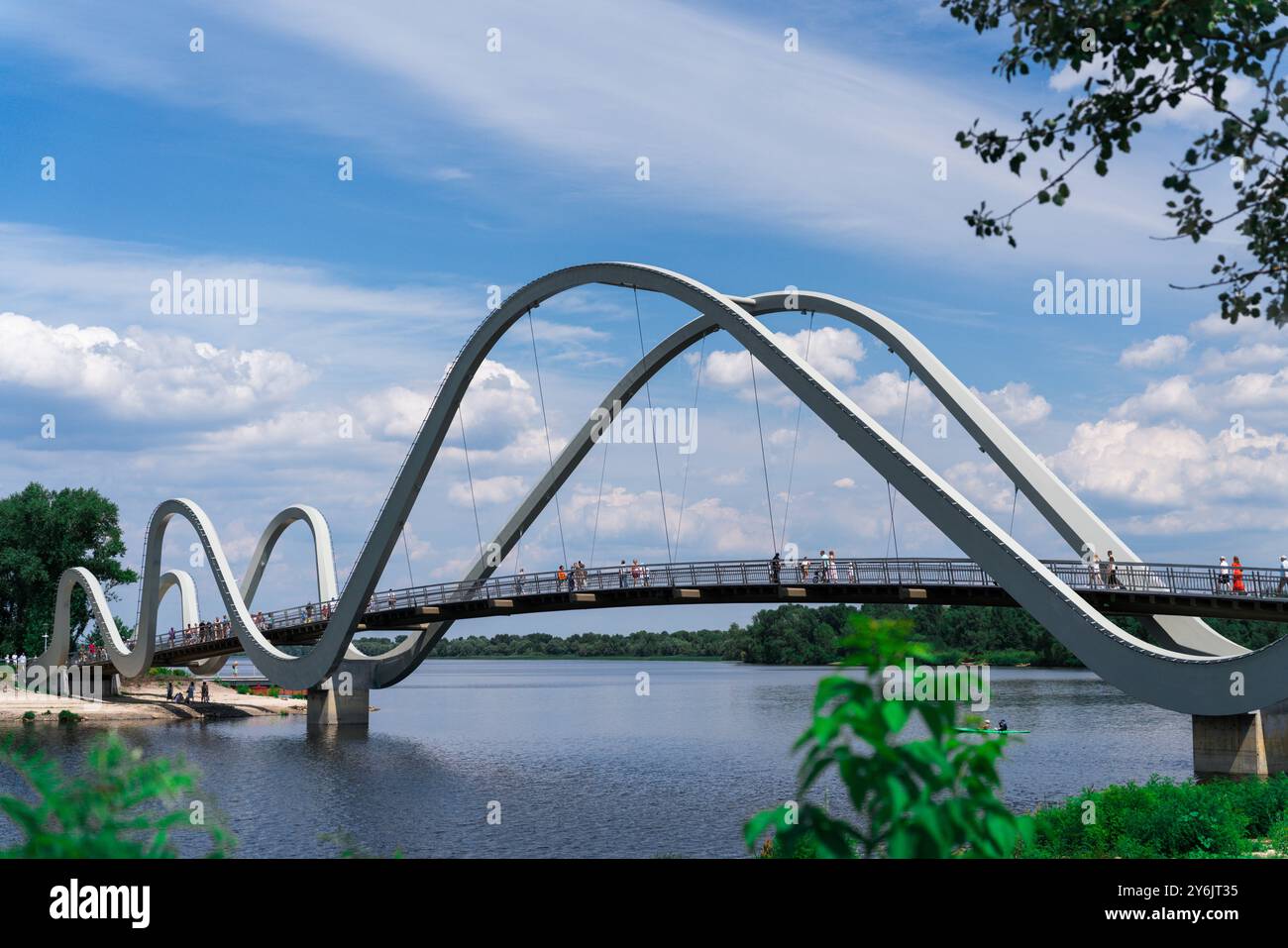 The Wave of Azov pedestrian bridge in Kyiv park Natalka Stock Photo - Alamy