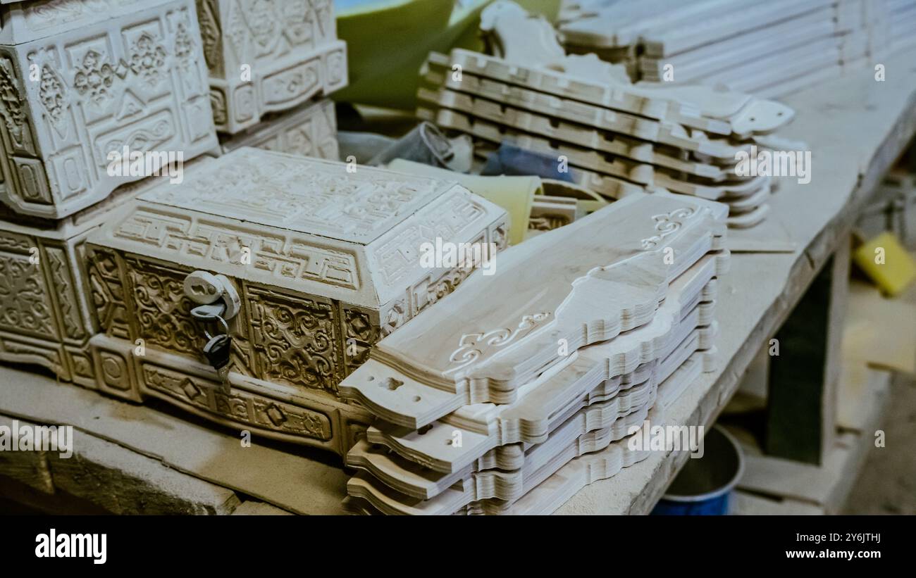 carving element. furniture in classic style. white color wood with gold ...