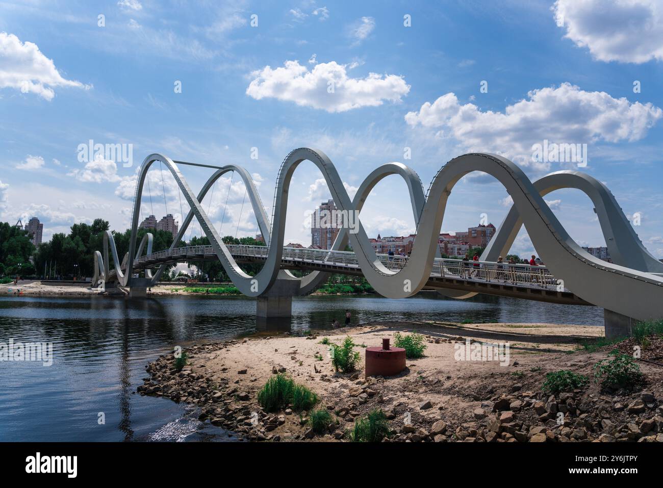 The Wave of Azov pedestrian bridge in Kyiv park Natalka Stock Photo - Alamy