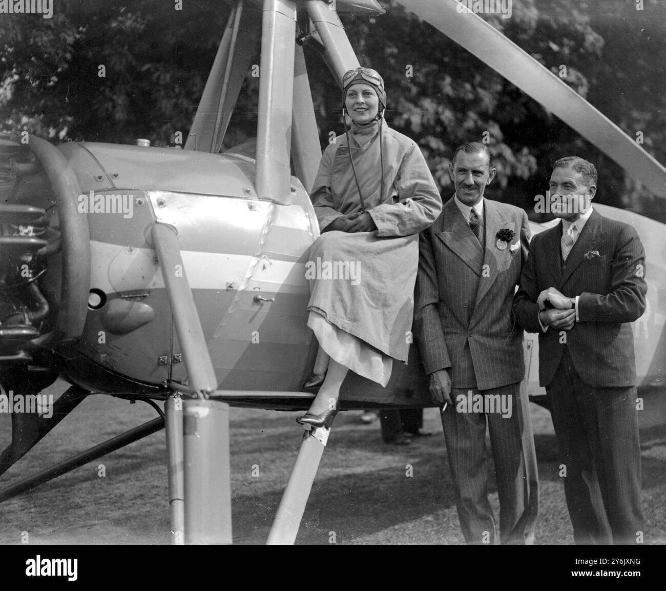 Arriving by "Autogiro" at the Hurlingham Club , West London , England ...