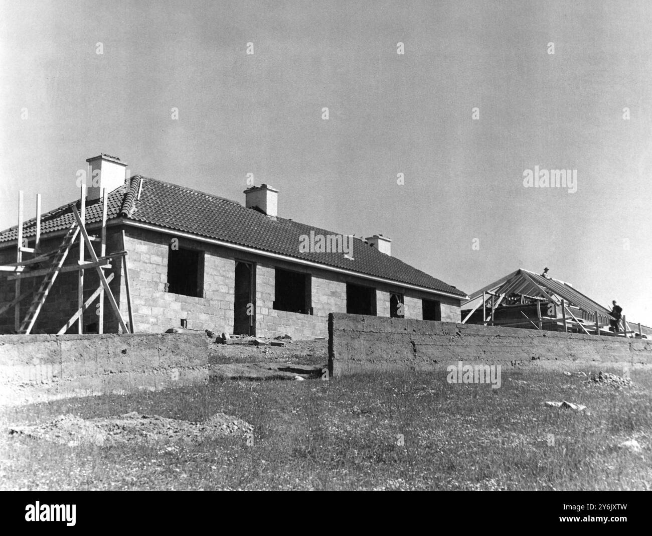 New cottages being built in Pontoon Co Mayo 21st March 1952 Stock Photo ...