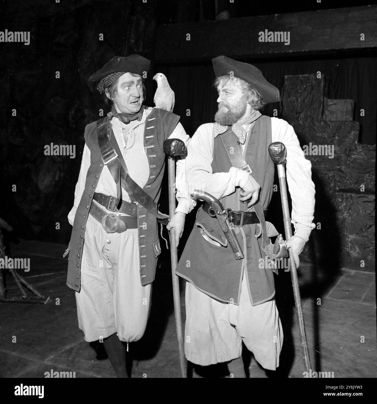 Parrot actor , Jack Sprat , perches on the shoulder of actor Peter ...