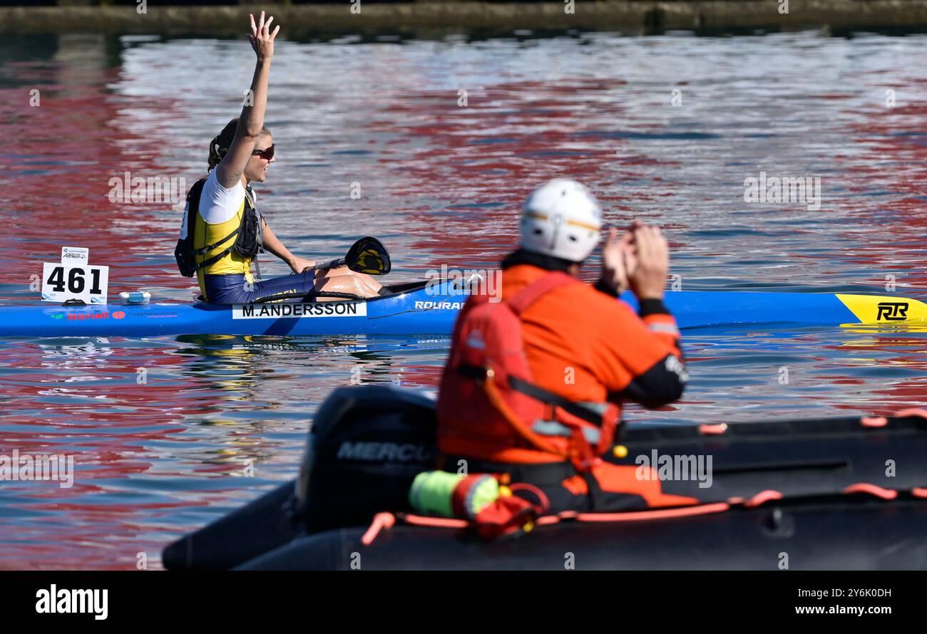 Melina Andersson (SWE) celebrates as she crosses the finish line in the ...