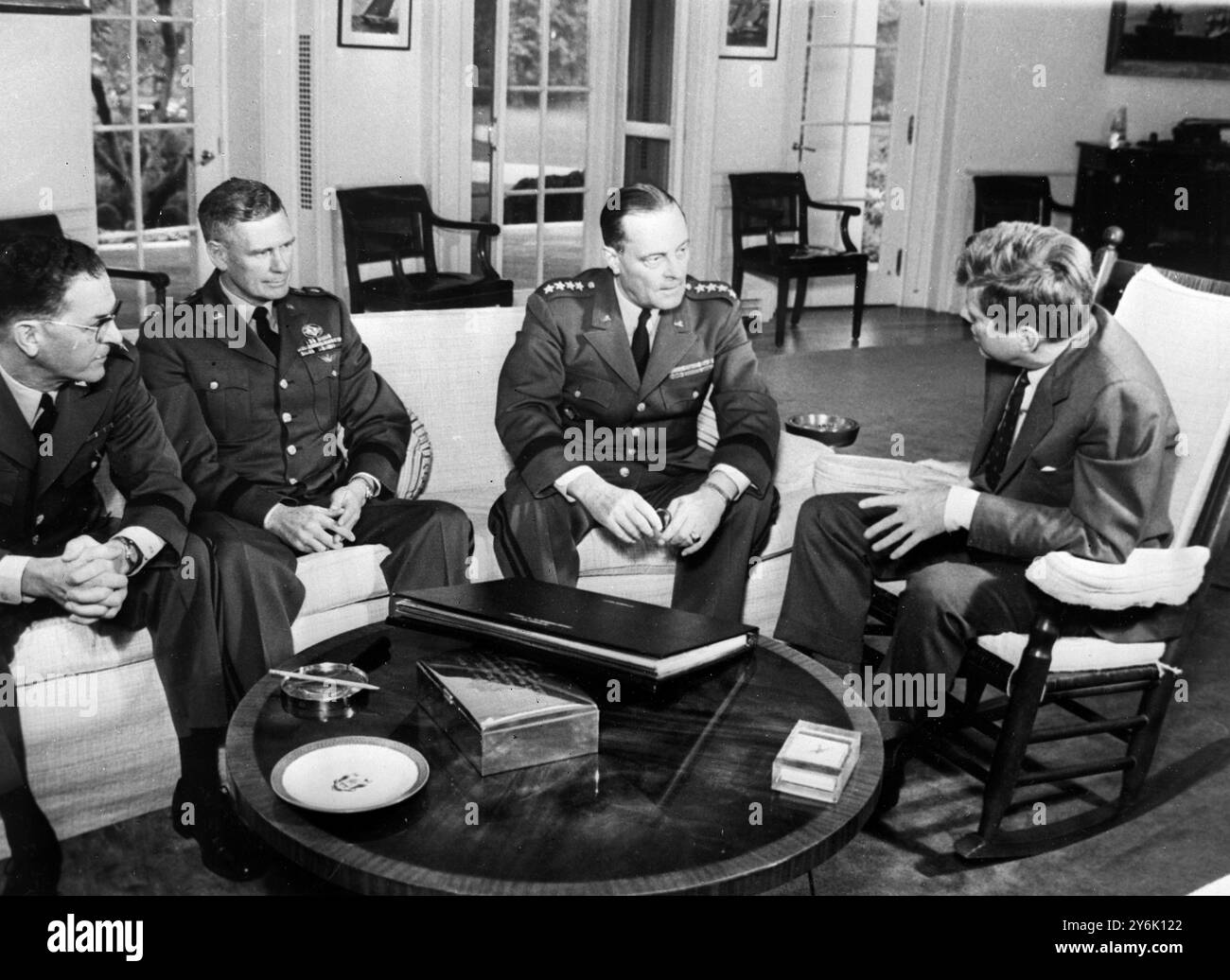 Washington President John Kennedy in rocking chair chats to Army Chief ...