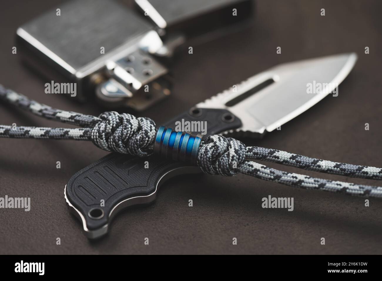 Close up the knife lanyard weaving from paracord rope Stock Photo - Alamy