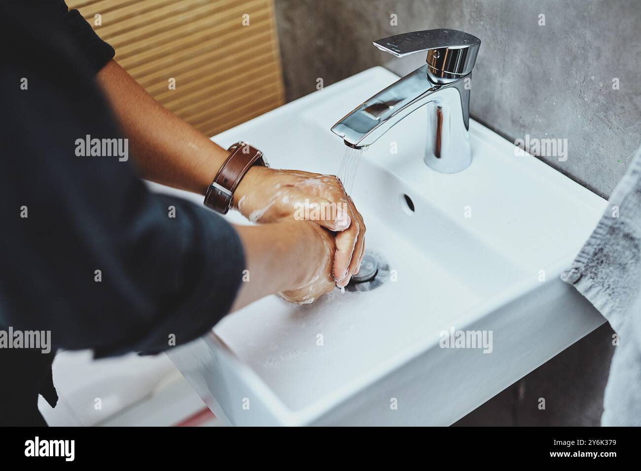 Washing hands, person and basin with liquid soap for bacteria, hygiene ...