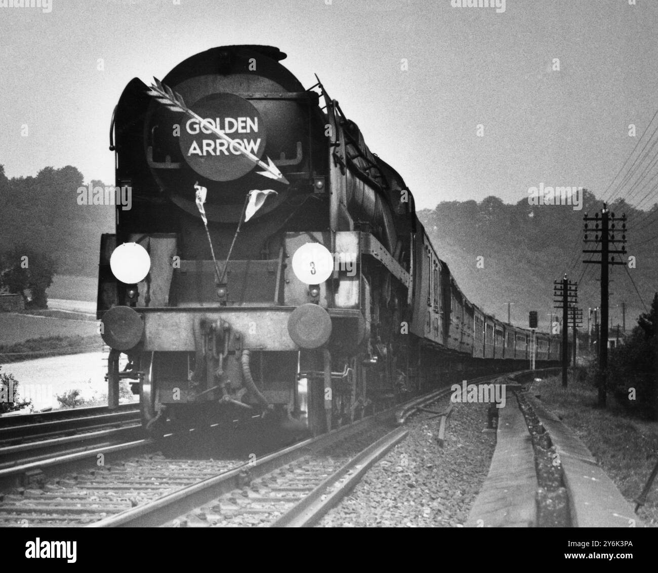 Golden Arrow steam train Stock Photo - Alamy