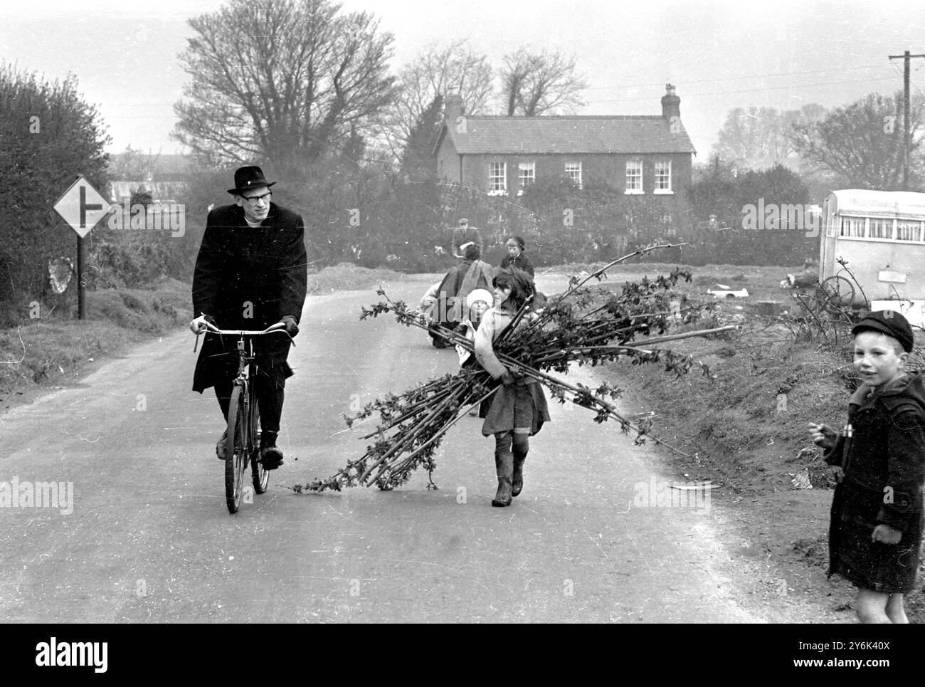 Dublin : A small troop of children in a country lane and a priest . Two ...