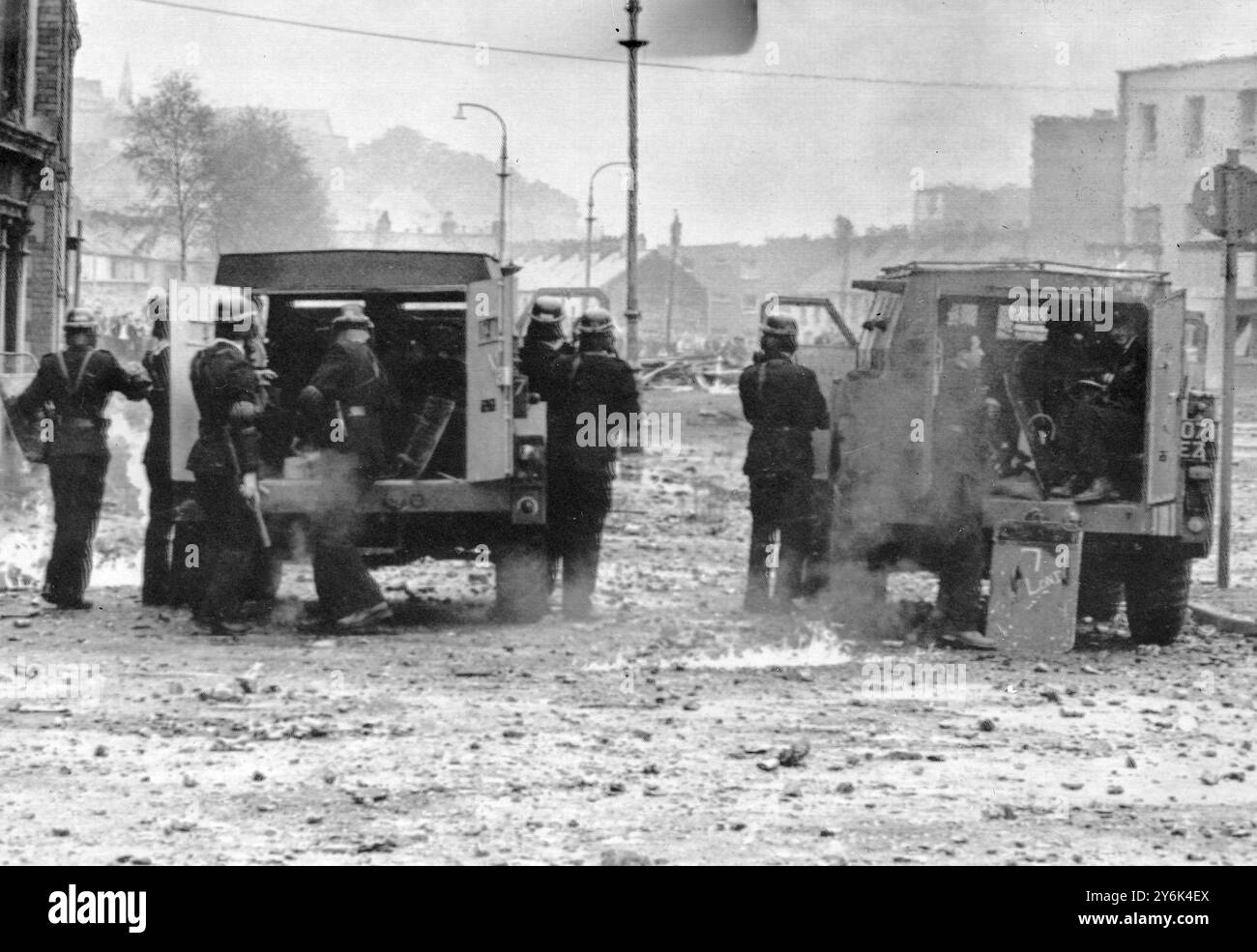 The battle of Bogside . Londonderry : Armour cars carrying riot police ...