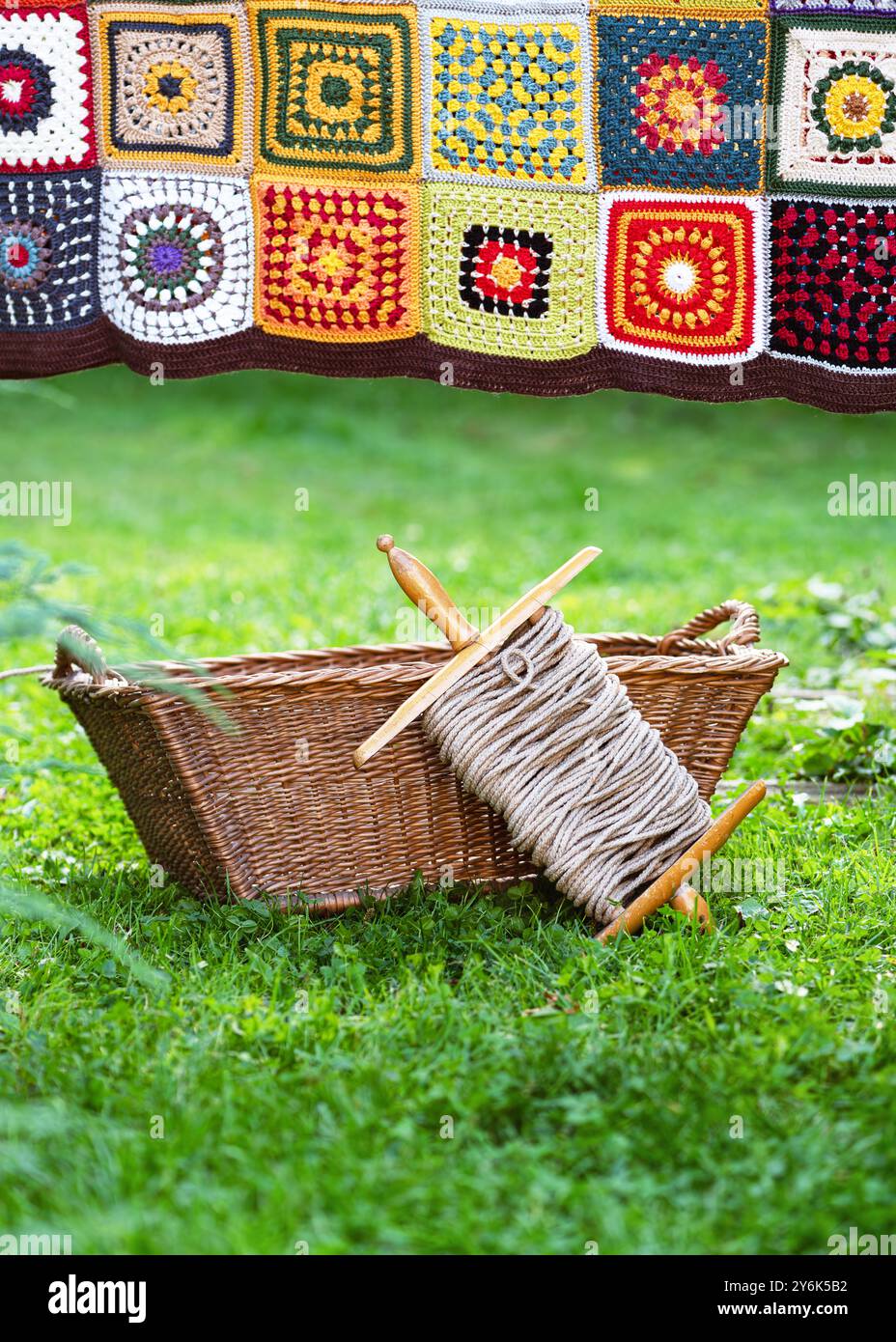 Rustic laundry wicker basket and an antique wooden clothespin with rope ...