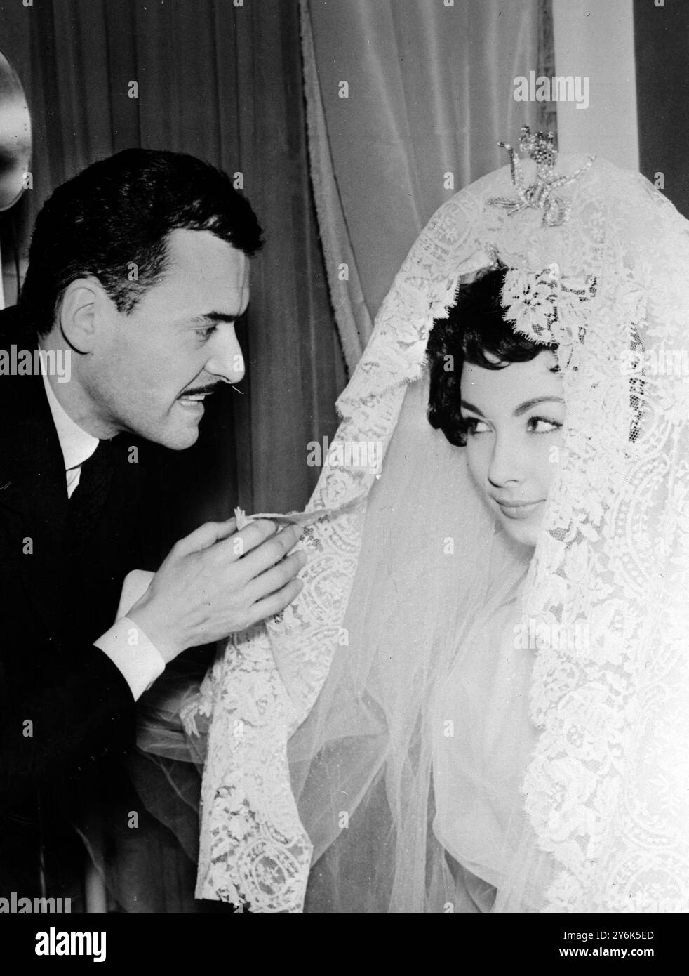 Parisian hair stylist Alexandra puts finish touches to the bridal ...