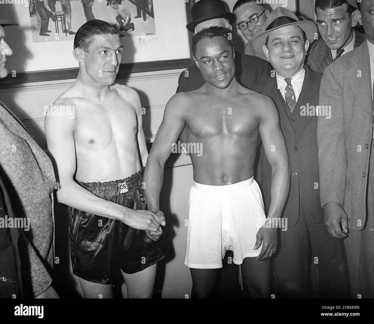 Weighing - in for their Harringay fight Ernie Roderick and Henry ...