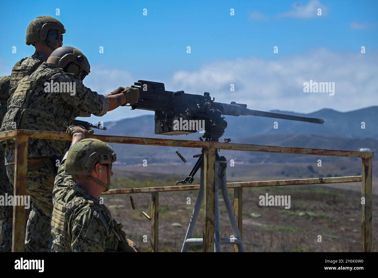 Members of Coast Guard Port Security 311 conducts weapons training at a ...