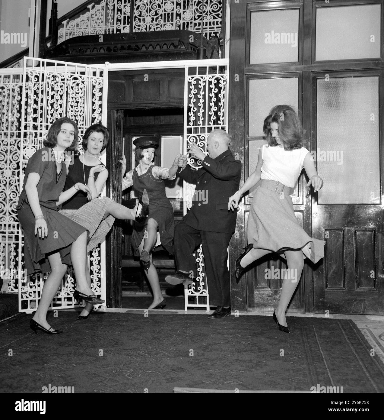 British Debutantes dancing to the Twist at rehearsals of the revue Take ...