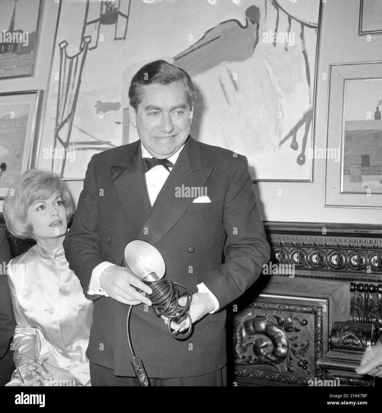 London Tony Hancock beneath some of his pictures at tonights West End ...