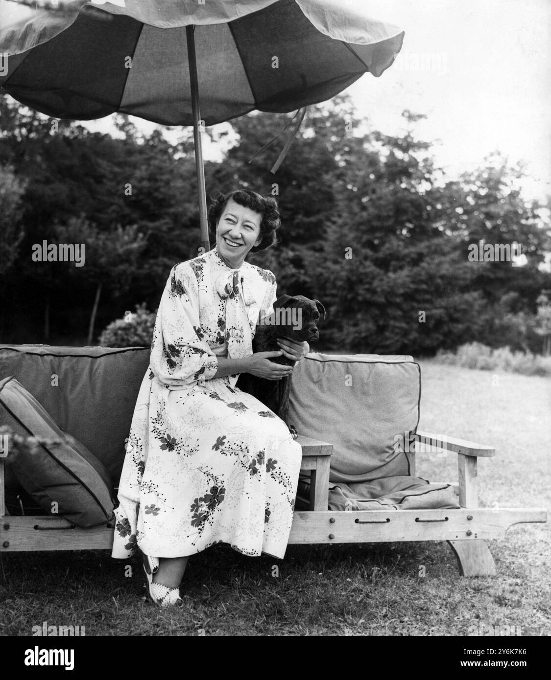 Flora Robson at home in Chalfont St Peter, Bucks, with her pet boxer ...