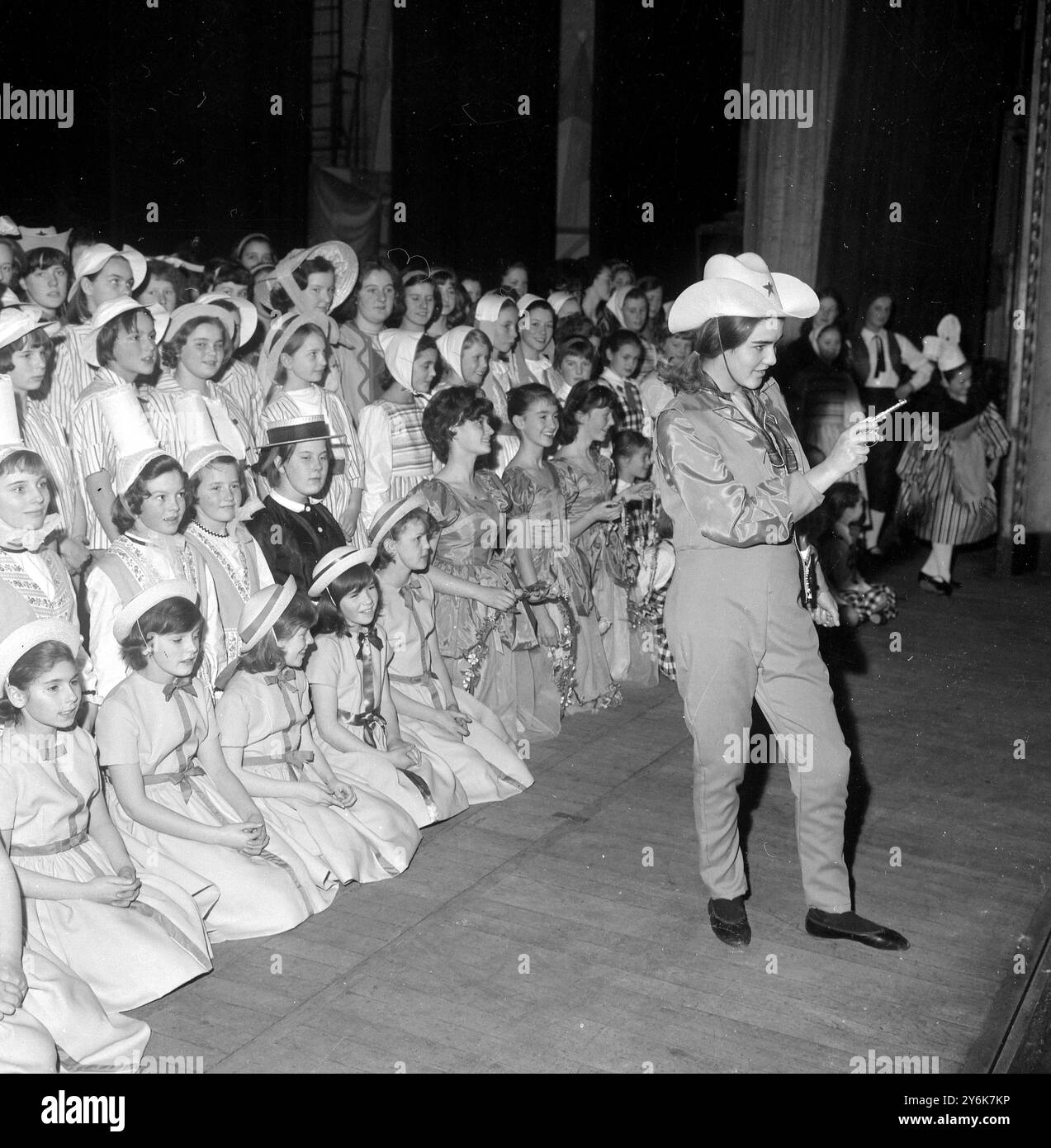 Wearing colourful and attractive costumes children from dancing school ...