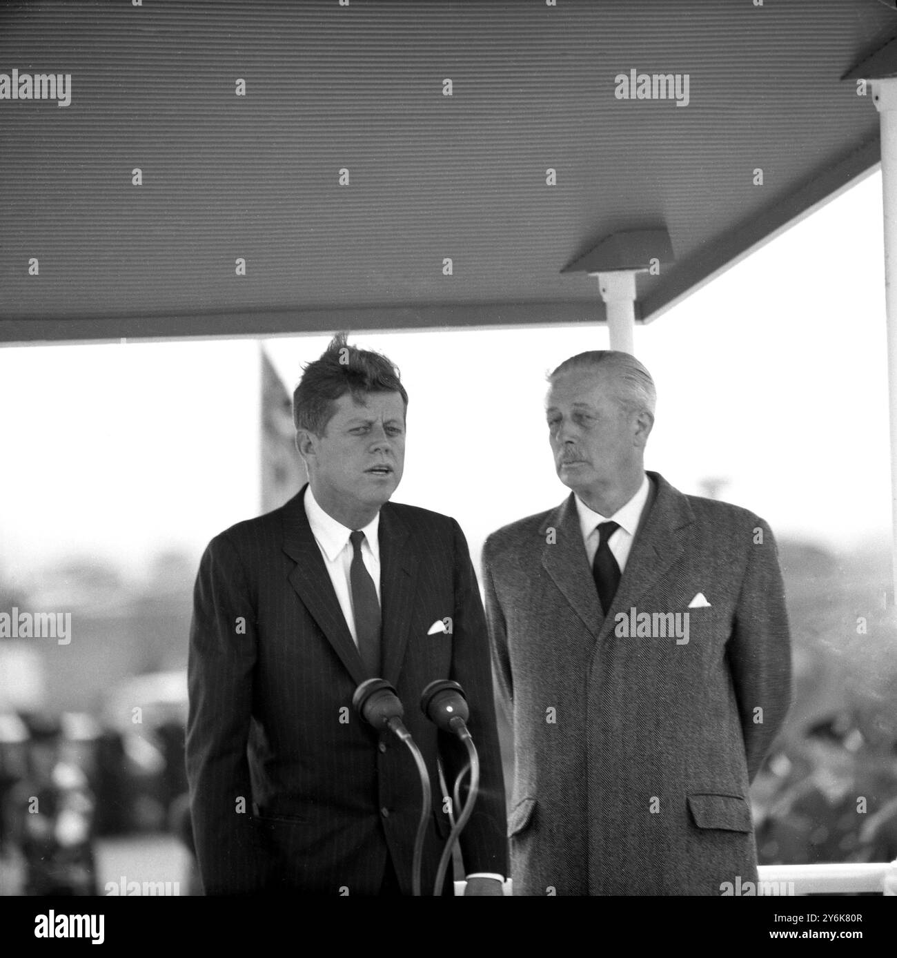President John F Kennedy (JFK) making a speech, with Harold Macmillan ...