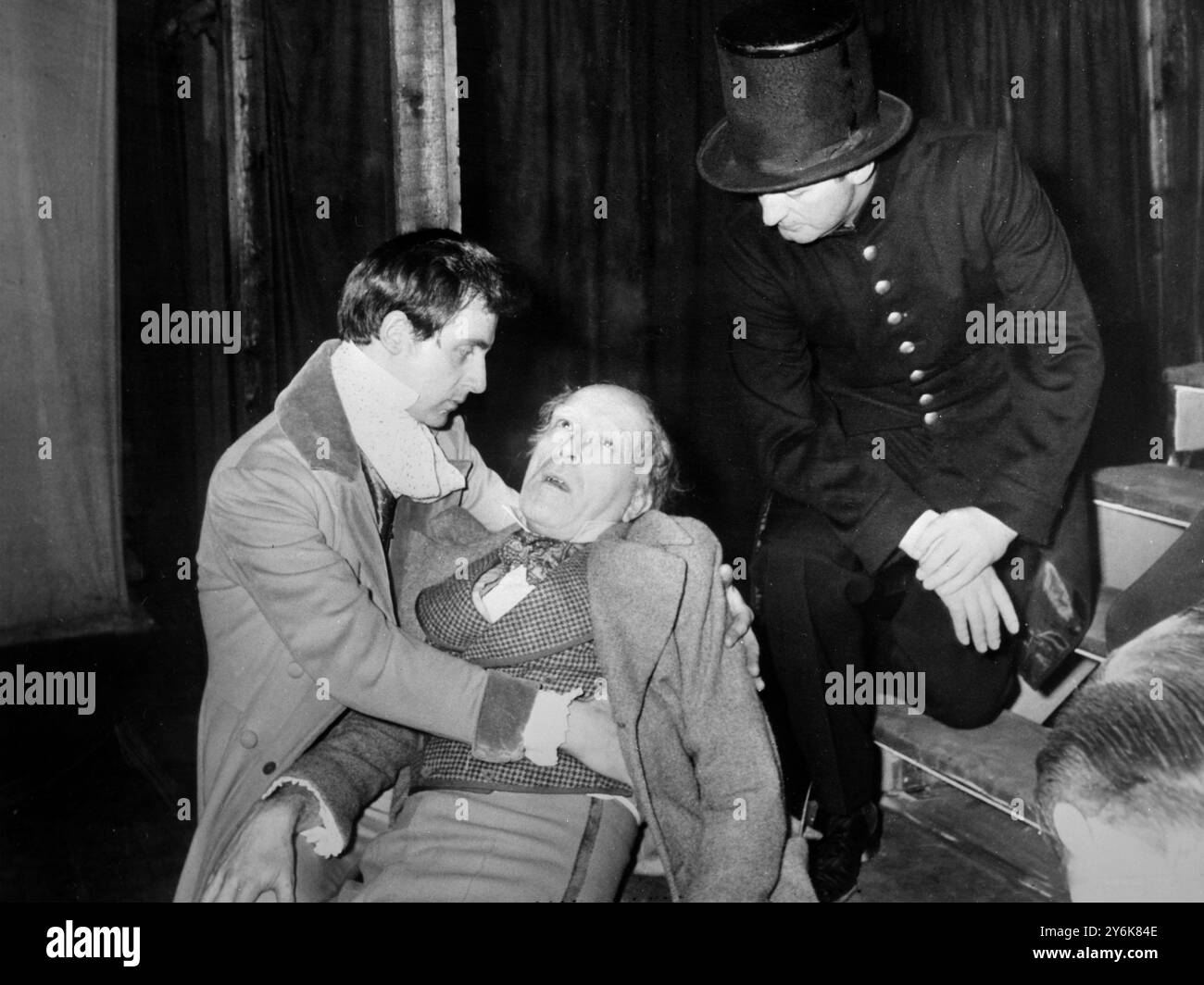 Magwitch played by Paul Curran dies in the arms of Pip played by Gary ...