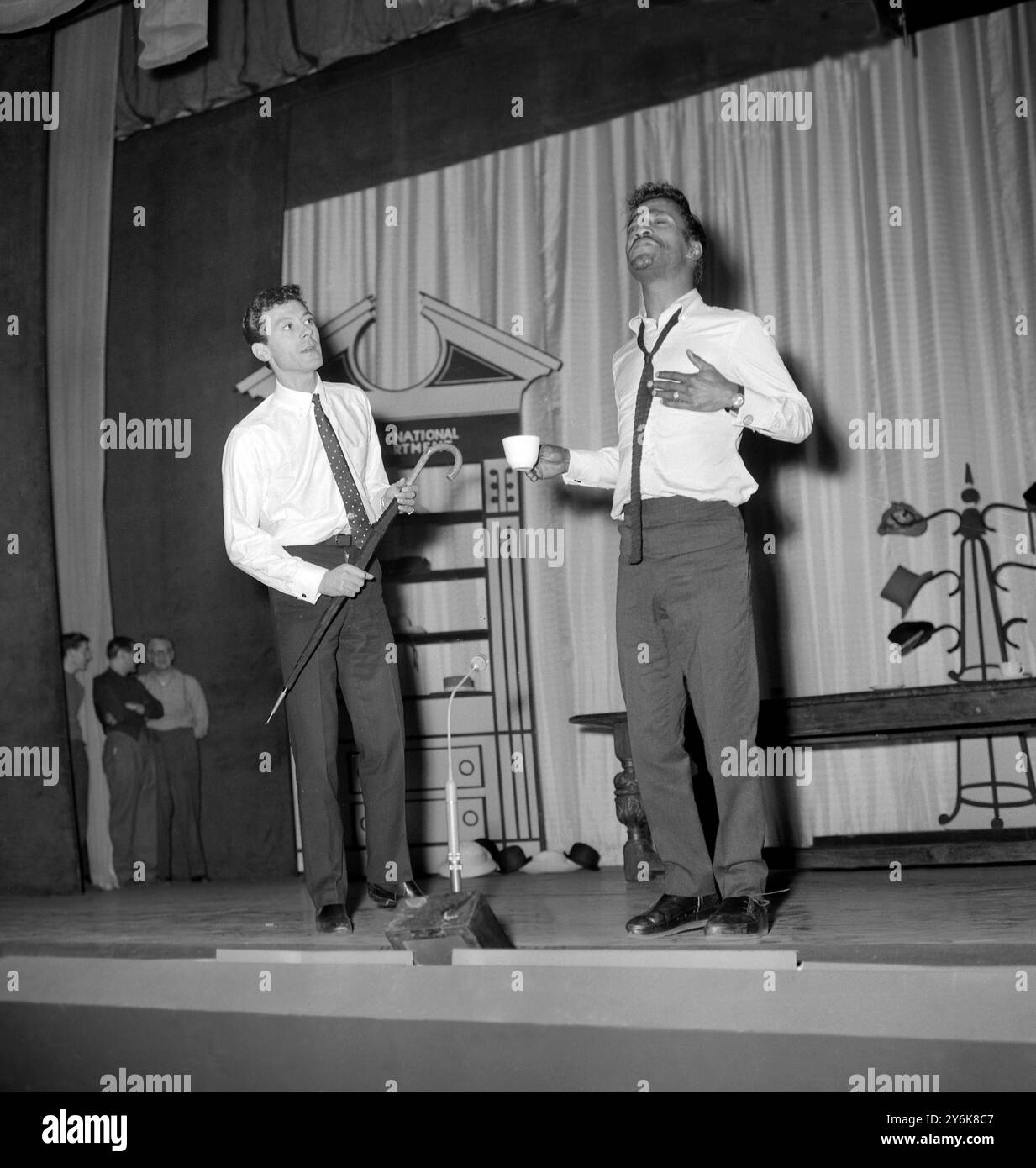 Holding a cup of tea in his hand popular American entertainer Sammy ...