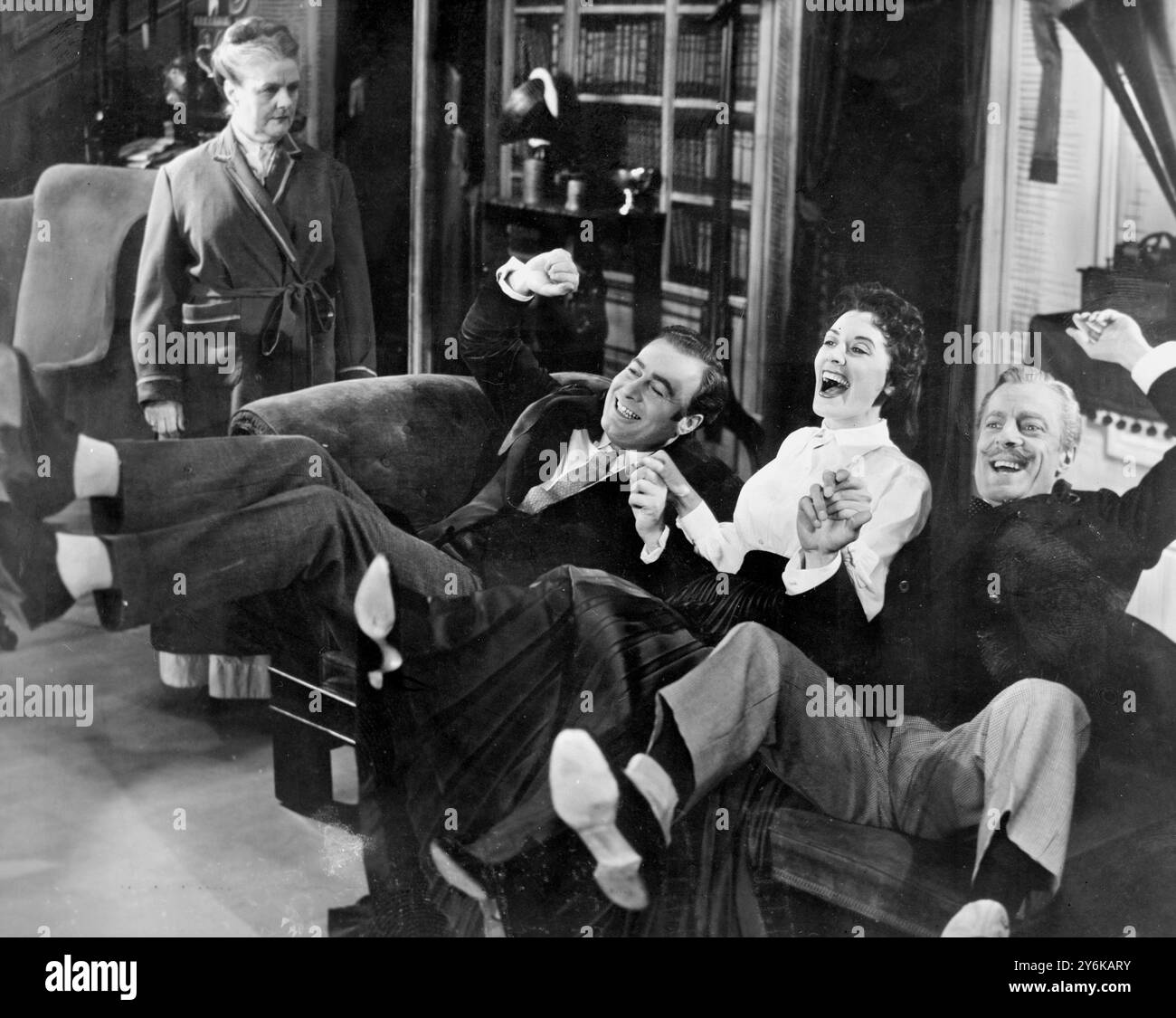 From left to right actress Betty Woolf , actor Charles Stapley ...