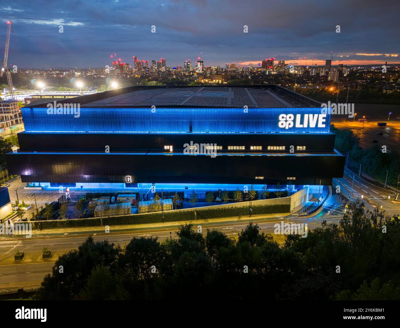 Aerial image of CO-OP Live Arena in Manchester UK illuminated at night ...