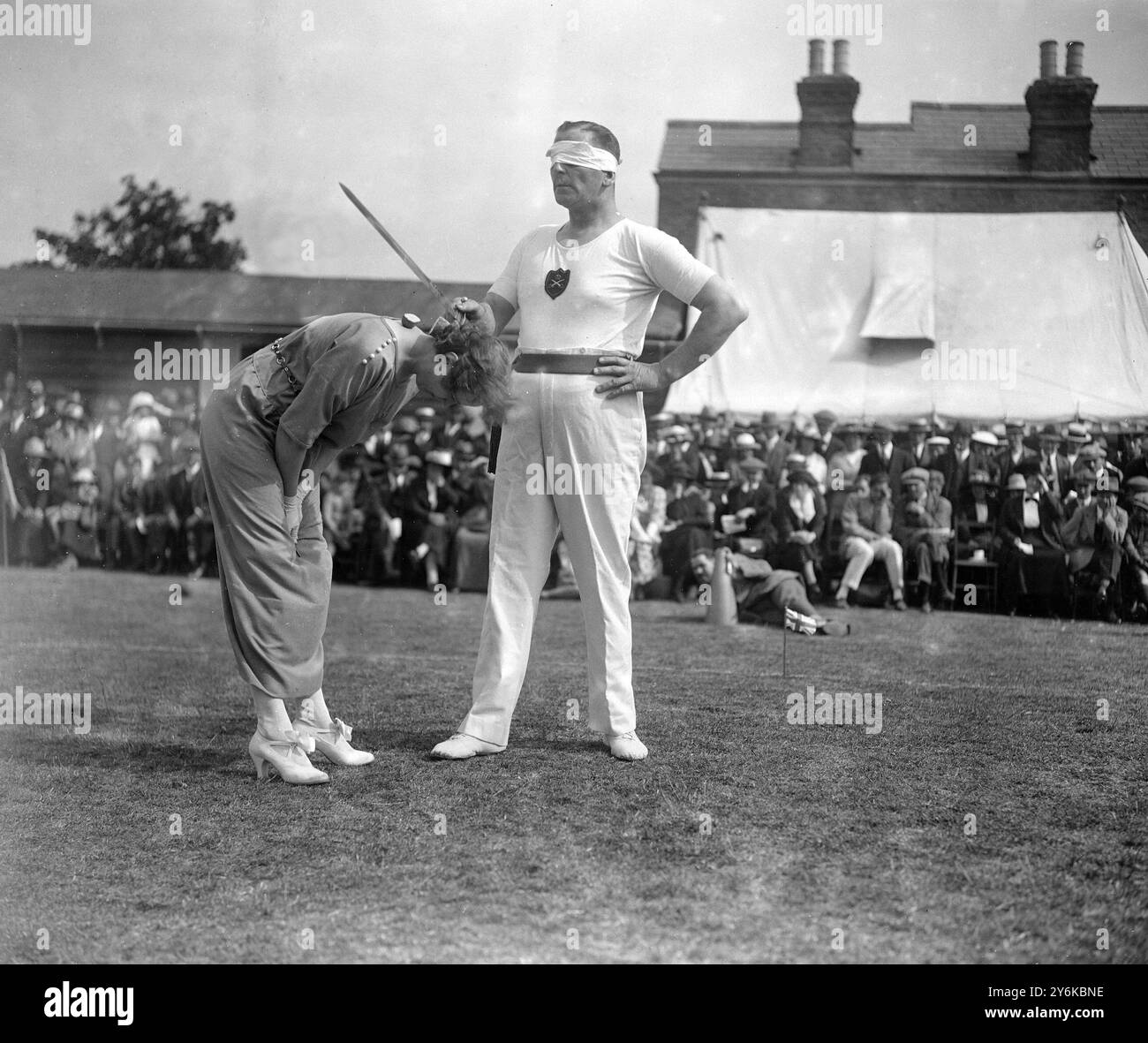 Kingston Comrades Sports Fair Sergeant Major Eggleton cuts the potato ...