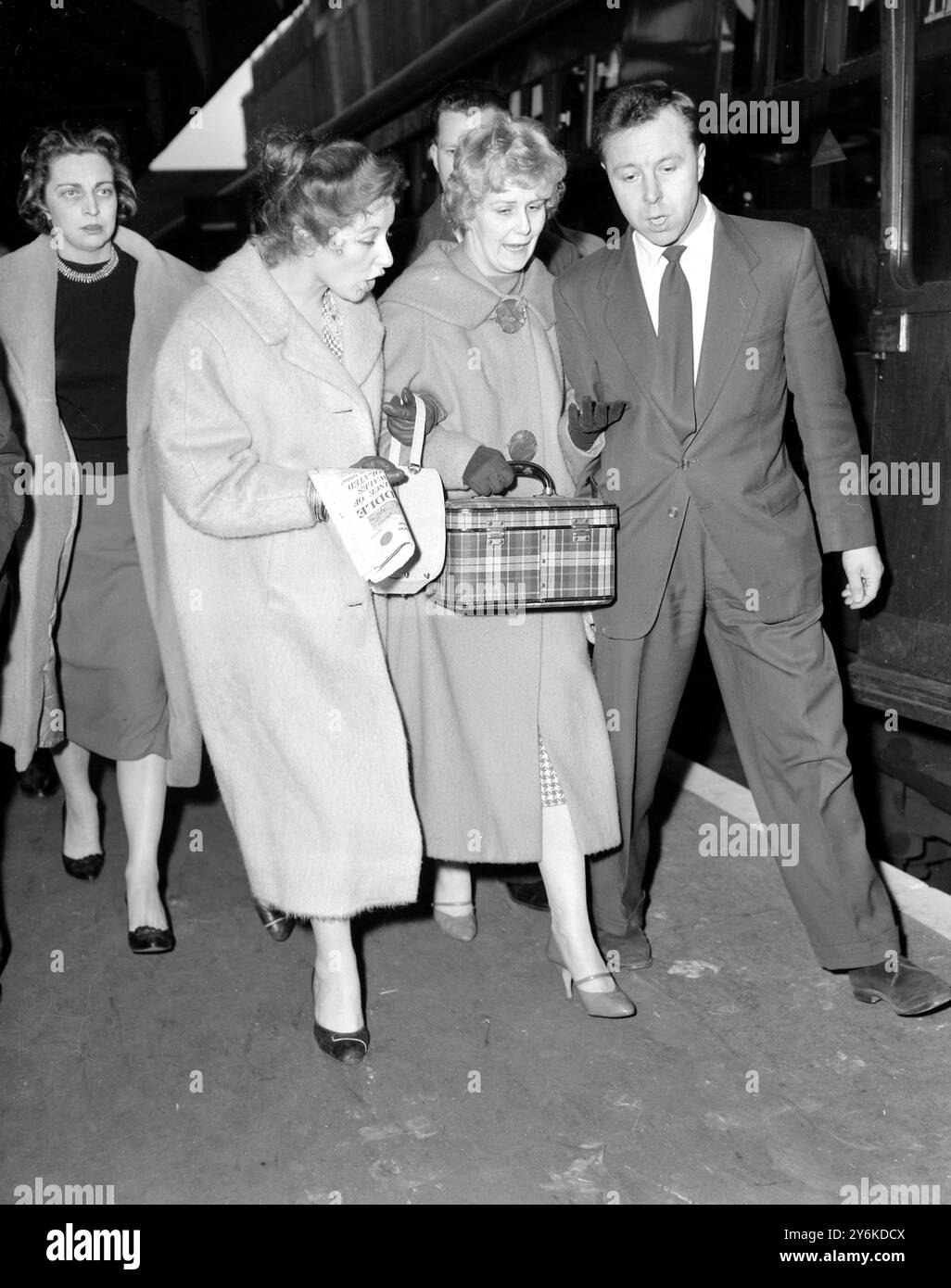 Folies Berger dancers Moira Price and Annette Sherwood arrive at ...