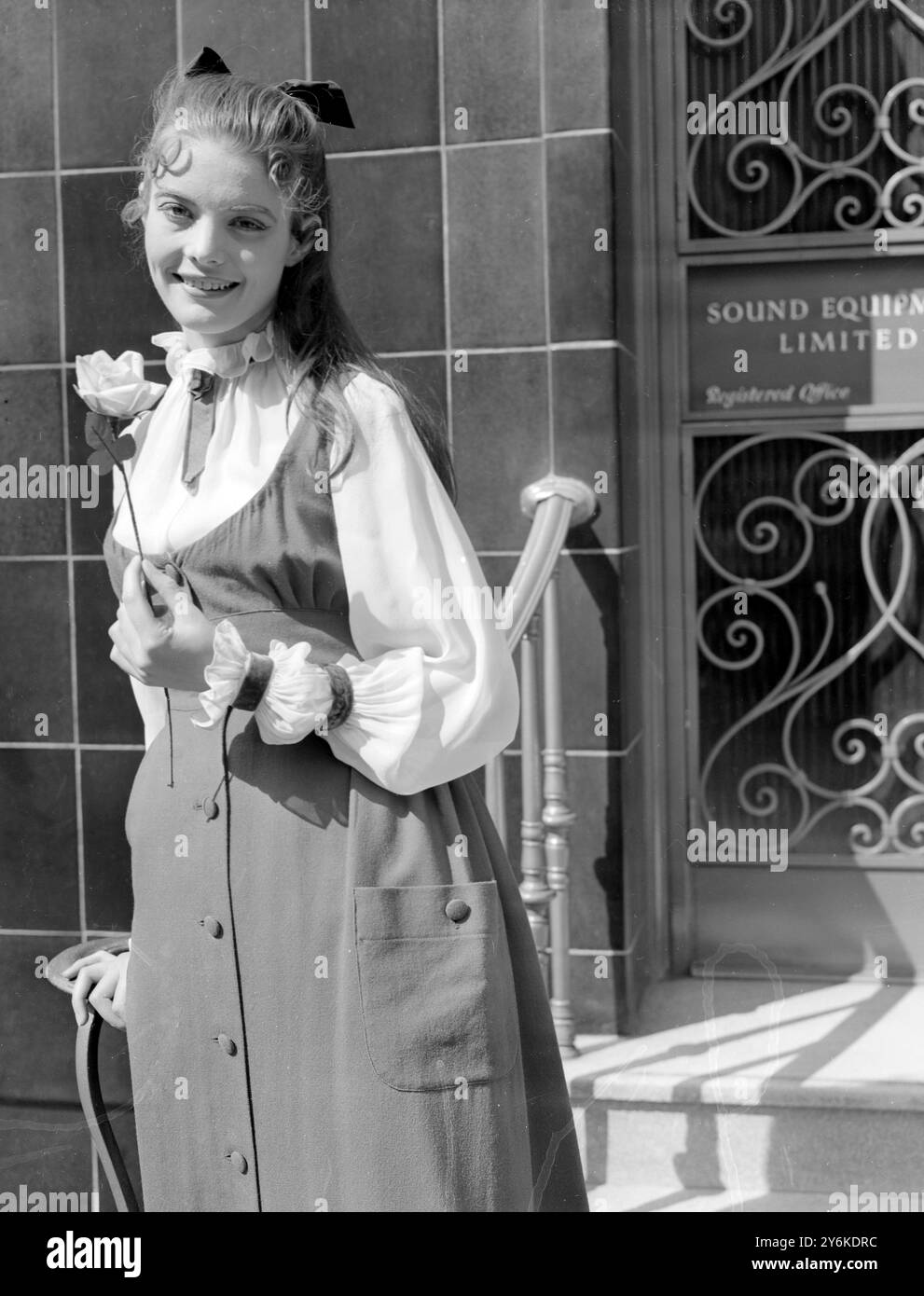 Preparing to make her debut on the English stage, young American actress LOIS SMITH rehearses at ...