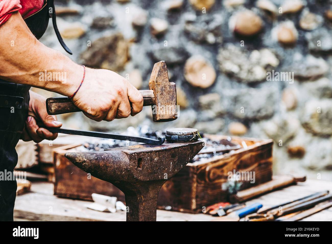 Close-up of a blacksmith's hands working Stock Photo - Alamy