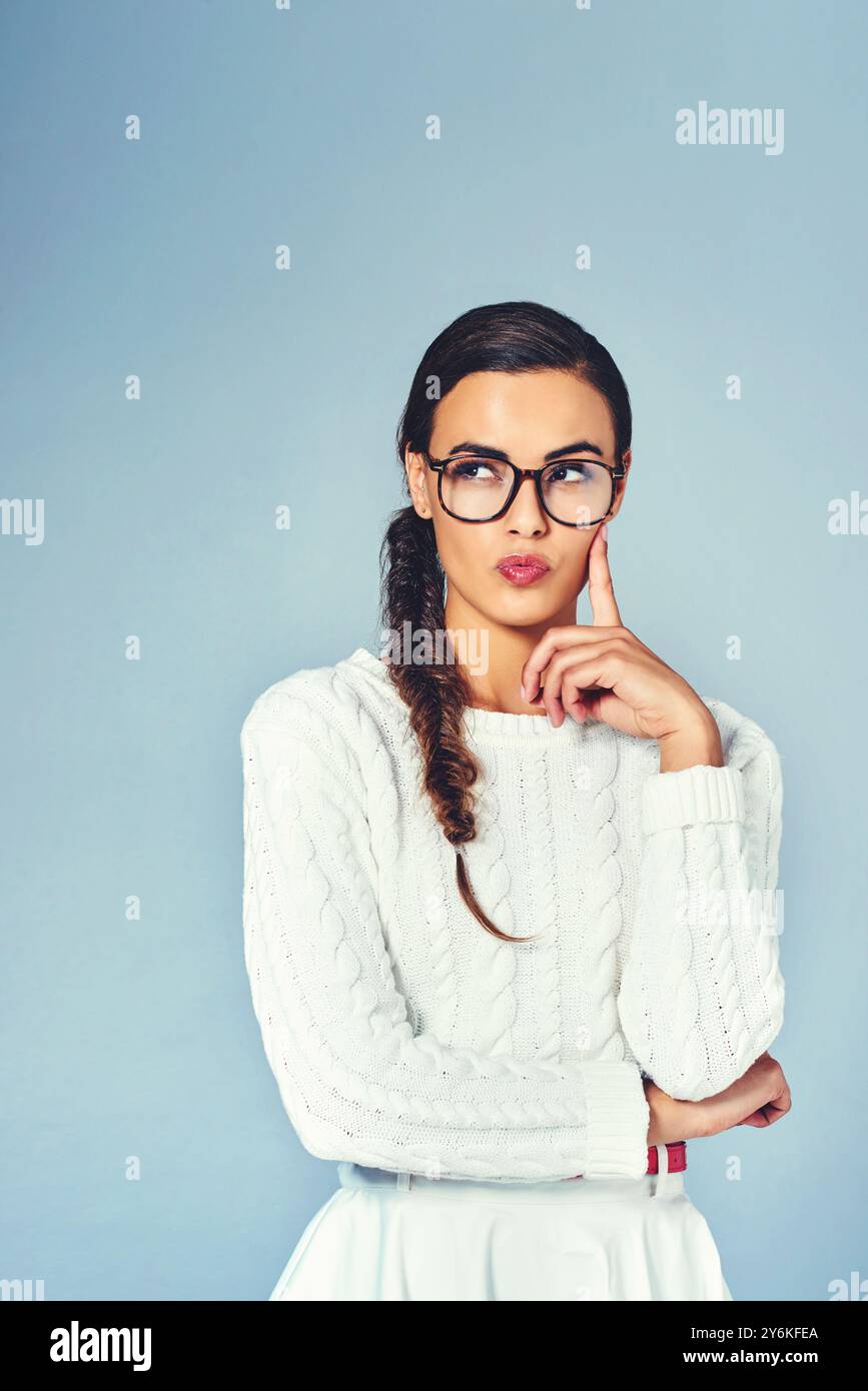 Thinking, glasses and woman with brainstorming in studio for future ...