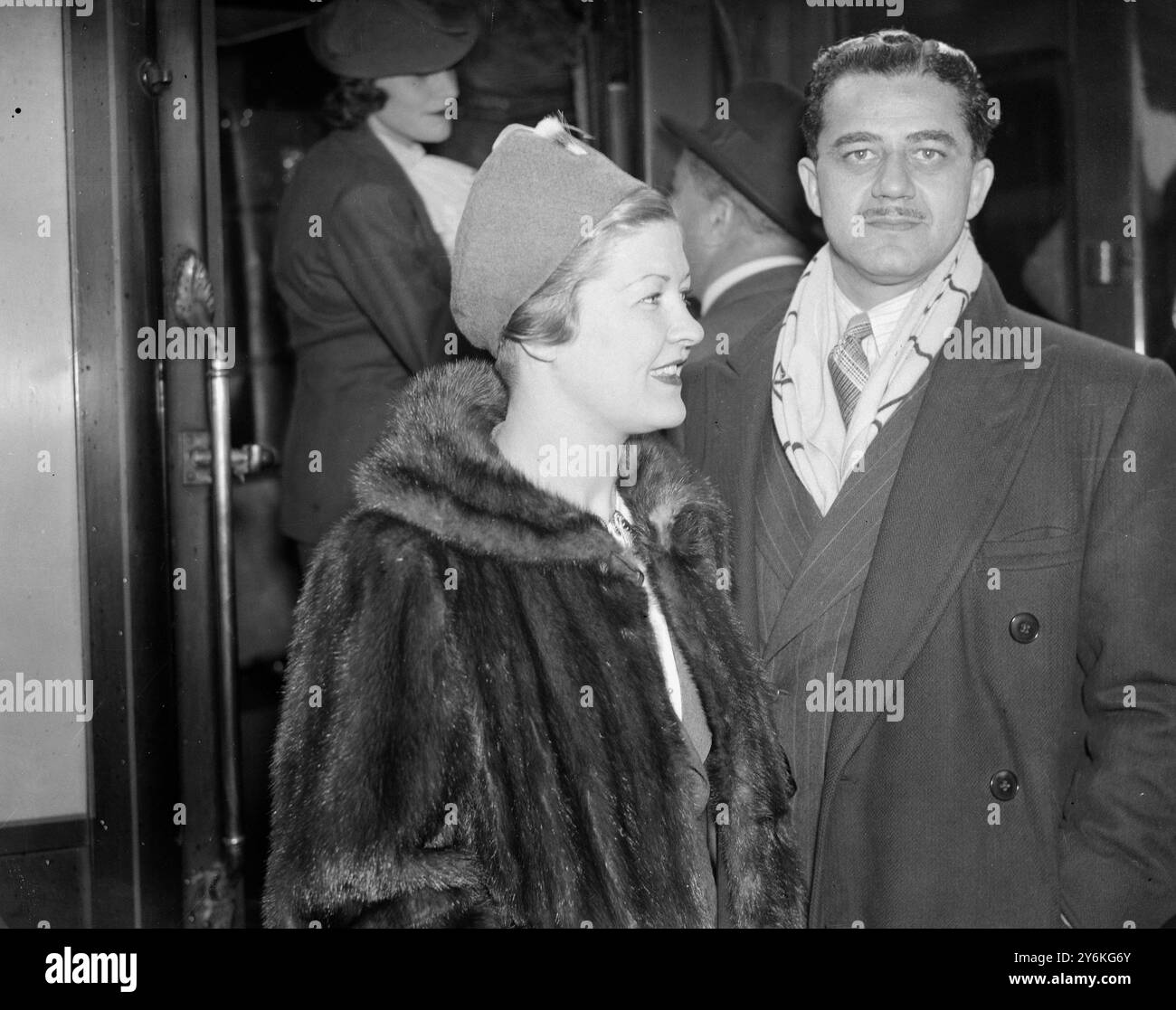 At Waterloo Station - Mr Irvine Ascher, the film producer, and his wife ...