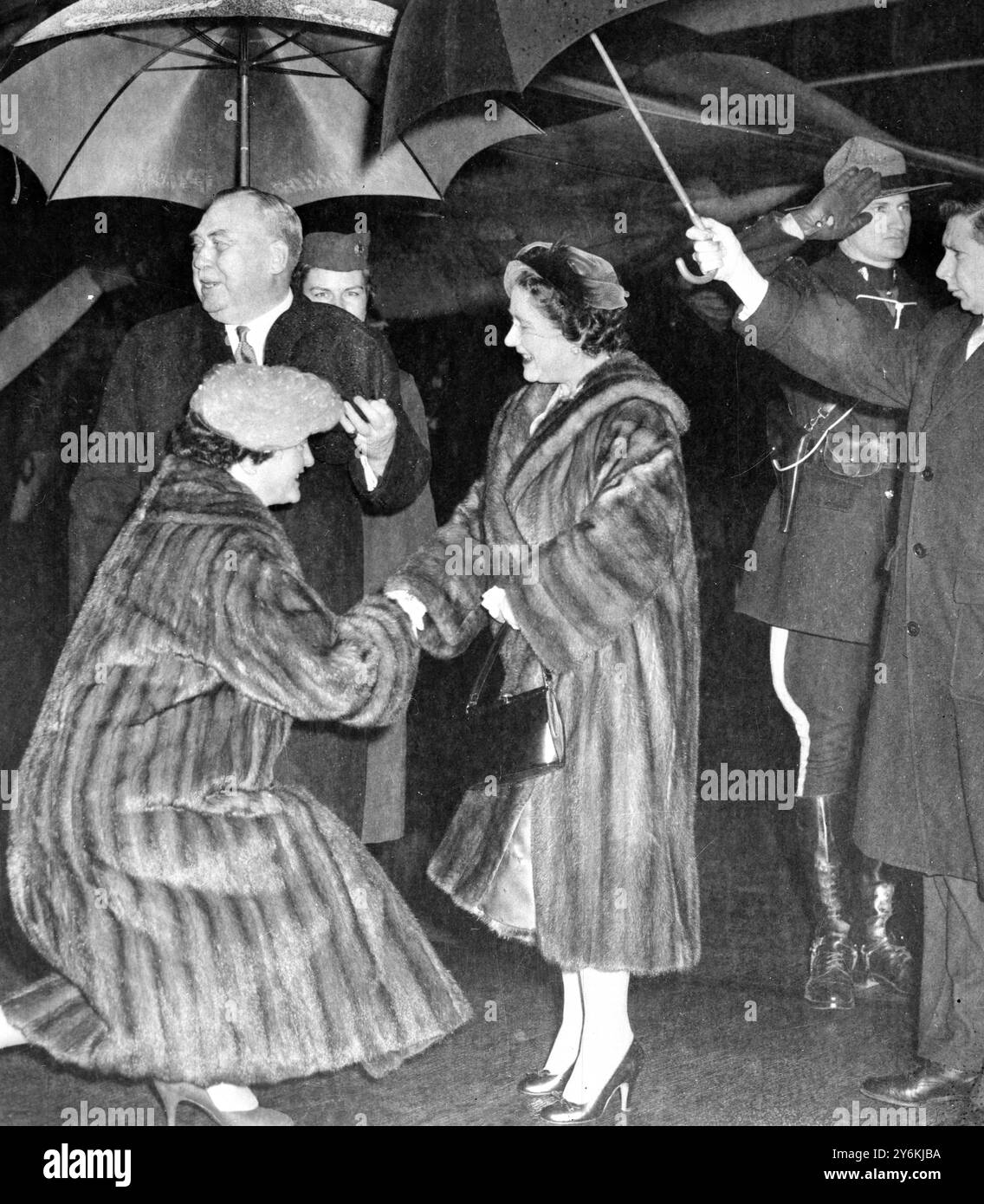 Vancouver Canada: Under the shelter of umbrellas, Queen Elizabeth the ...