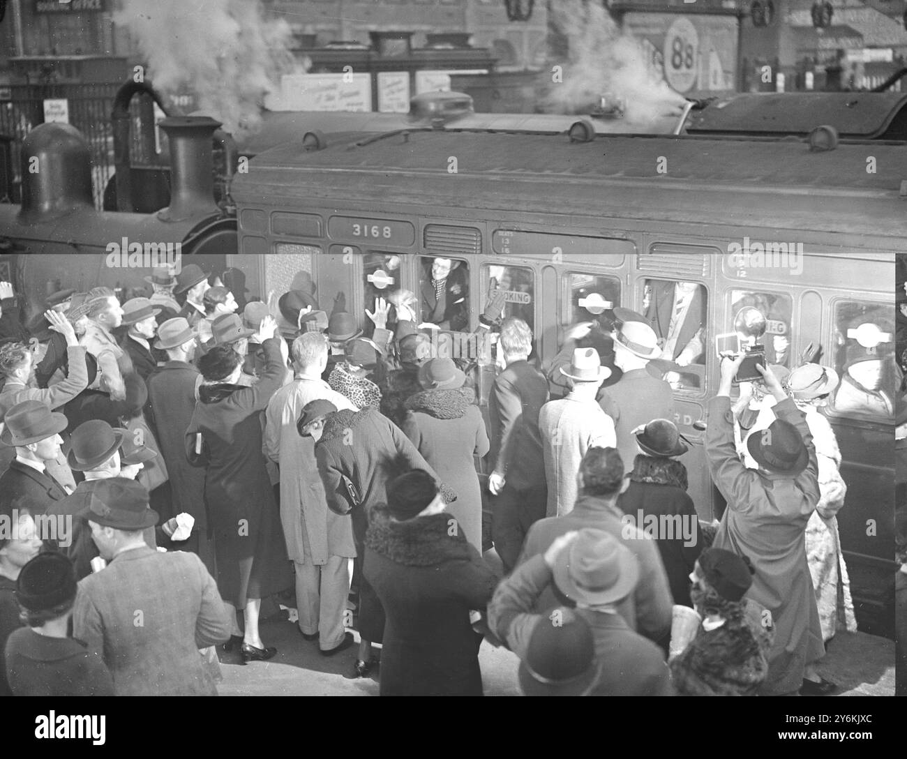 At Waterloo station Boarding the trains. 1 February 1936 Stock Photo ...