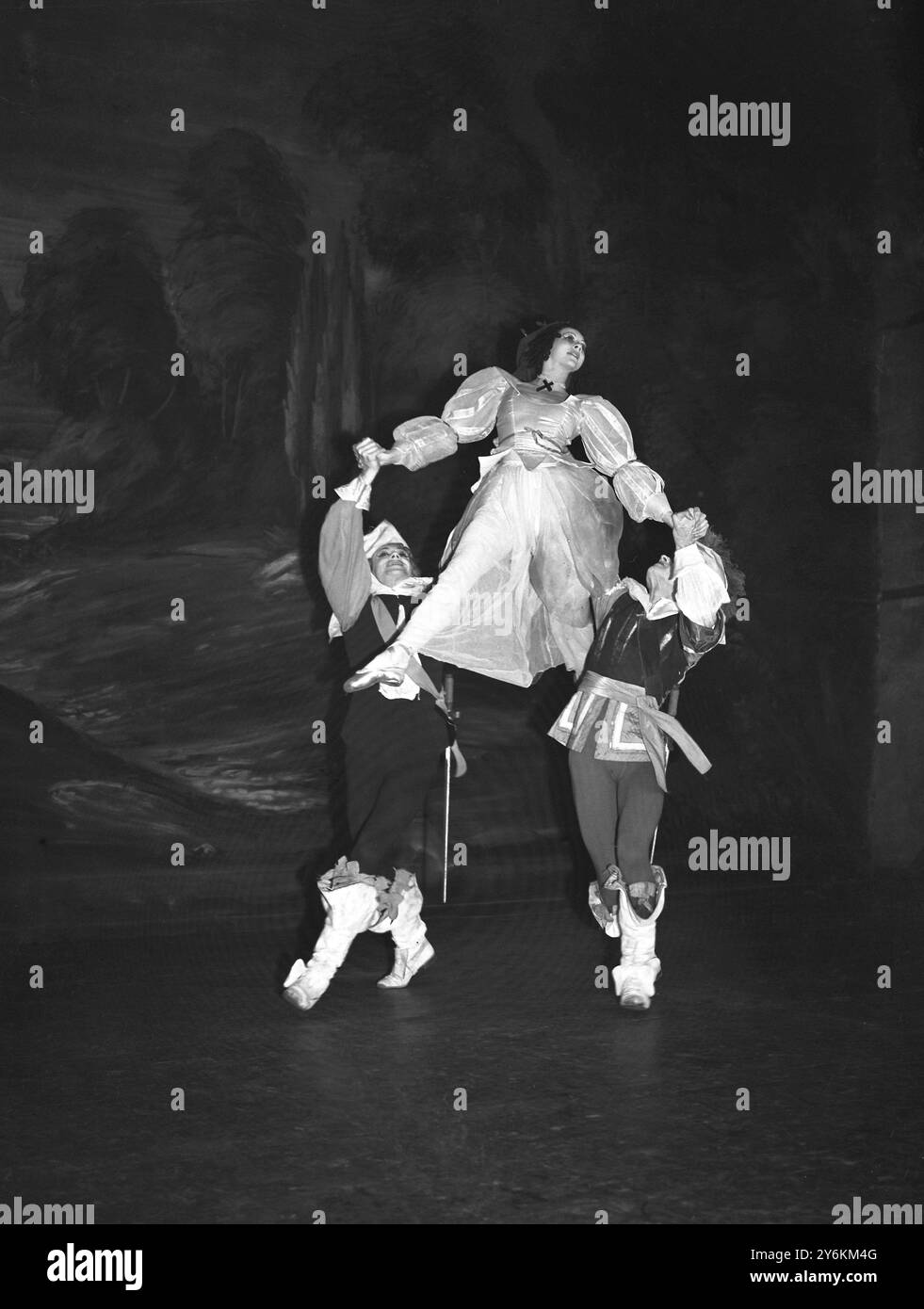Beryl Grey being lifted by dancing partners on stage in front of ...