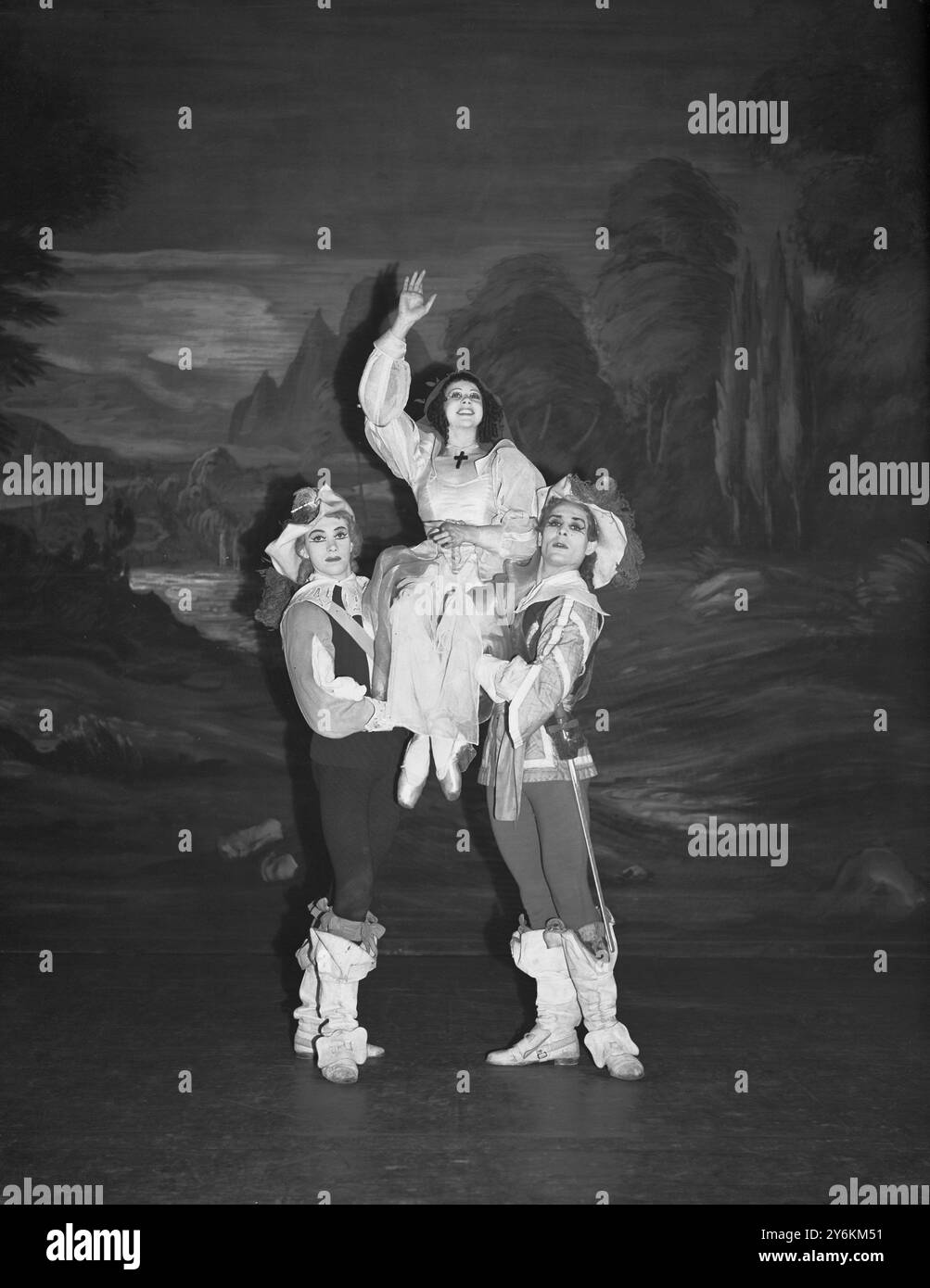 Beryl Grey being lifted by dancing partners on stage in front of ...